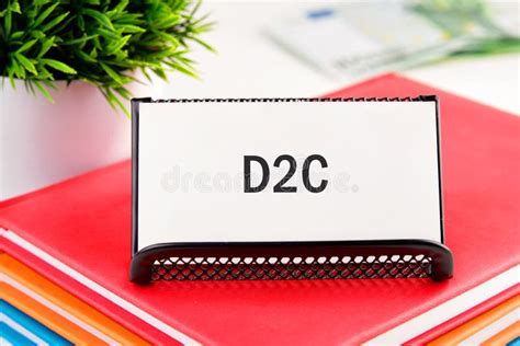 Business And D2c Direct To Consumer Concept Concept Words D2c On A Business Card Standing In A