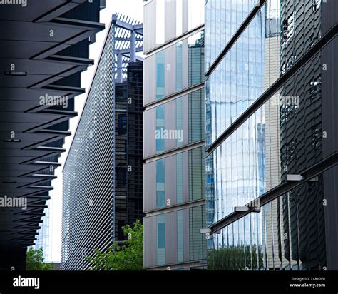 Modern Architectural Design In London Showcasing Sleek Glass And Steel Structures With Dynamic