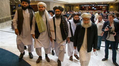 Afghan Forces Hit With Wave Of Attacks On Eve Of Taliban Talks The