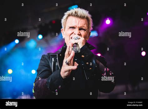 The English Rocker Billy Idol Performing Live On Stage In Front A Sold Out Square In Brescia For