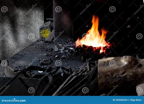 Vivid Fire Burning In A Traditional Forge With Glowing Coals