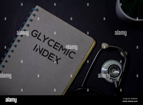 Glycemic Index Write On A Book Isolated On Office Desk Healthcare Or Medical Concept Stock