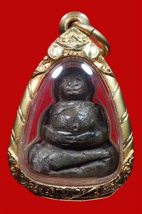 พระสังกัจจายน์ หลวงพ่อแก้ว วัดเครือวัลย์ เนื้อผงคลุกรัก