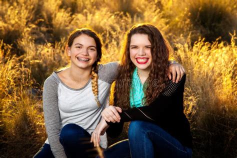 Sisters In A Backlit Field Stock Image Image Of Bond 68143399