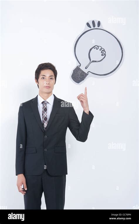 A Man Pointing The Bulb Stock Photo Alamy