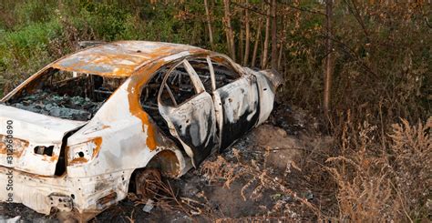 Burnt Out Wrecked Car Closeup After An Explosion Or Fire View Of A