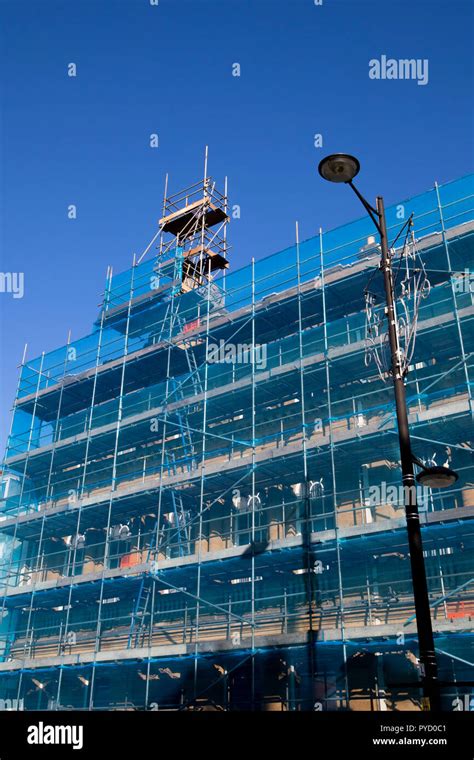 Scaffolding With Safety Netting Renovation Works Being Carried To
