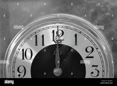 Old Long And Short Clockwises Pointing On Twelve O Clock At Noon Or Midnight Background Stock