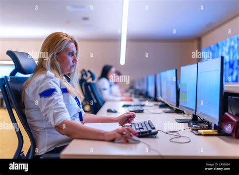 Female Security Operator Working In A Security Data Control Room Offices Stock Photo Alamy