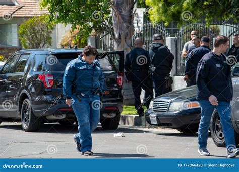 A Black Female Detective From Lapd`s Metro Division Walks By Police After Valley Homicide