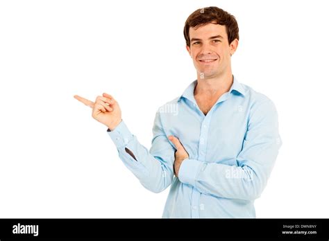 Happy Man Pointing Empty Copy Space Over White Background Stock Photo Alamy