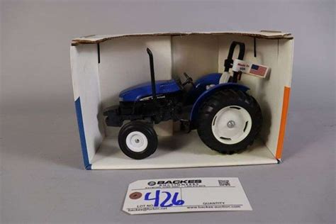 Jle New Holland Tn75 Tractor With Rollbar Die Cast With Box 1 16 Scale Backes Commercial