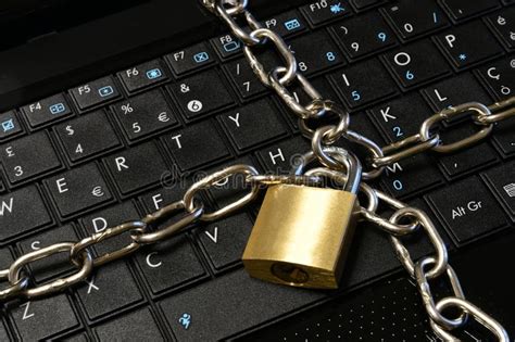 Computer Security Concept With An Iron Chain And Padlock On The Laptop