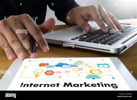 IOT Business Man Hand Working And Internet Of Things IoT Word Diagram As Concept Use Browsing