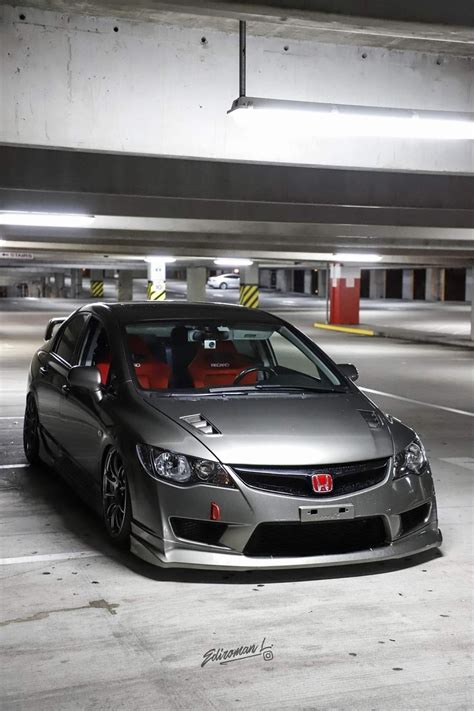 Silver Honda Civic Car In A Parking Garage
