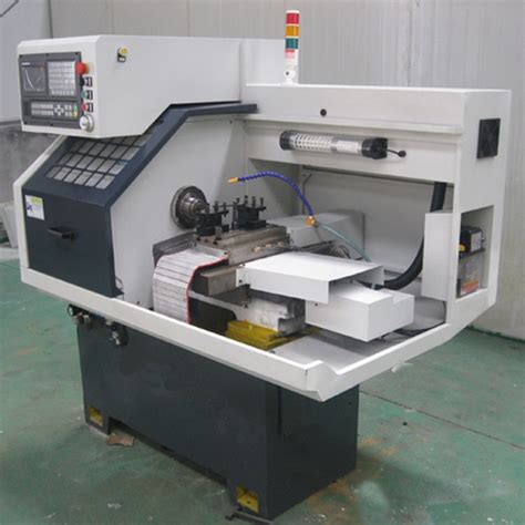 소형 Cnc 선반 봉 피더 자동 공급 선반 선반 기계 의 고품질 소형 Cnc 선반 봉 피더 자동 공급 선반 선반 기계