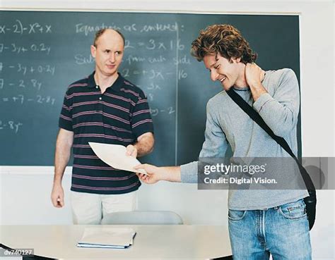 Handing In Homework Photos And Premium High Res Pictures Getty Images