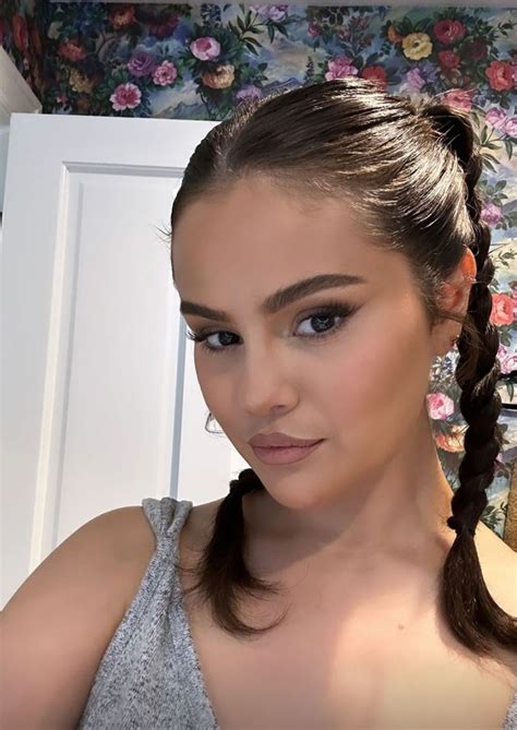 Selena Gomez Stuns As She Shows Off Her Curves In A Skintight Nude Bodysuit And Jean Shorts For