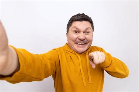 Premium Photo Delighted Man Pointing At You Looking At Camera With