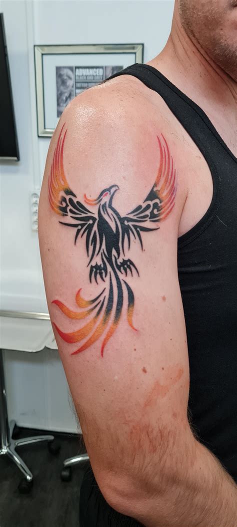 Phoenix Tattoos For Men Symbolism Designs And Placement Tips