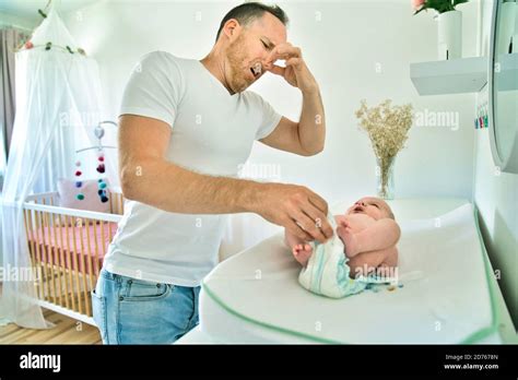 Baby Diaper Change Dad Hi Res Stock Photography And Images Alamy