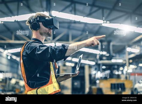 Engineer Male Using Vr Virtual Reality Technology In Modern Warehouse Factory New Innovation