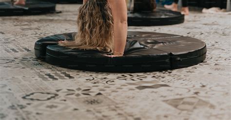 A Woman In A Bikini Doing A Handstand On A Pole Photo Women Image On