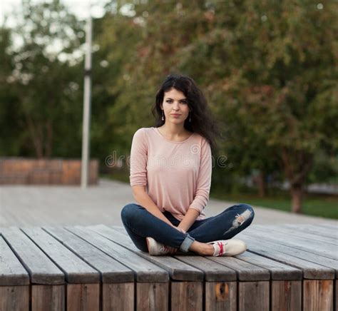 Beautiful Tall Girl With Long Hair Brunette In Jeans Standing On Old
