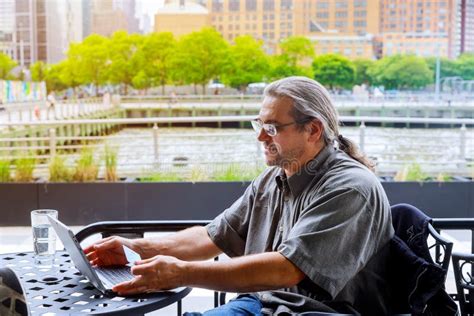 Man Using Credit Card And Laptop Shopping Online Outdoor Stock Image Image Of Digital