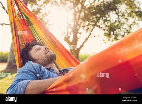 Man Relaxing In Hammock Stock Photo Alamy