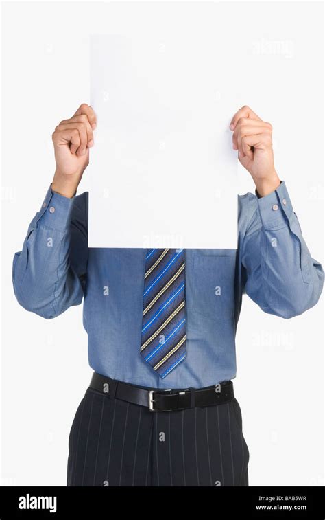 Businessman Holding A Blank Placard Stock Photo Alamy