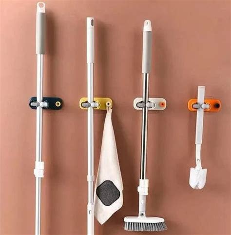 Купить Настенный держатель для швабр | Настенный фиксатор инвентаря ...