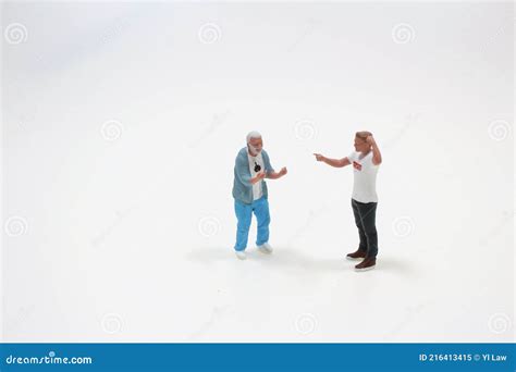 A Fun Of Tiny Man Fighting With The Man Stock Image Image Of Gesture