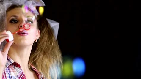 Stock Footage Woman Blowing Soap Bubbles Live Wallpaper