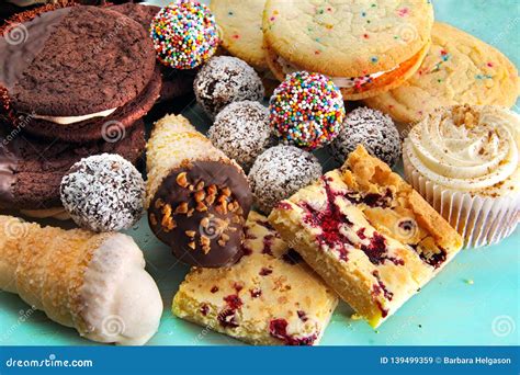 Assortment Of Baked Sweet Treats Including Chocolate Rum Balls