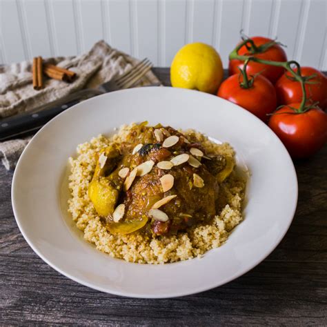 Moroccan Style Chicken Tagine With Eggplant Tomatoes And Almonds Over