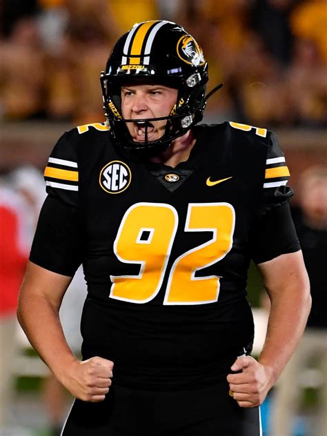 Missouris Star Kicker Harrison Mevis Takes A Comedic Helmet Bump In Teammates Overenthusiastic