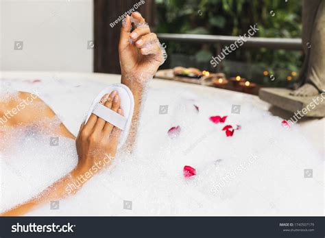 Girl Taking Bath With Loofa Over 12 Royalty Free Licensable Stock