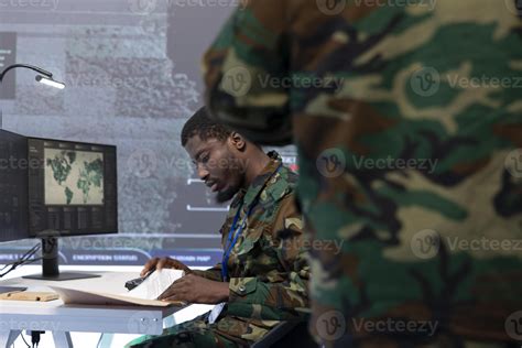 Military Officer Oversees Surveillance And Cybersecurity Operations In A High Tech Army Command