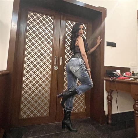 Poonam Pandey Photoshoot In Strapless Crop Halter Top See Pictures