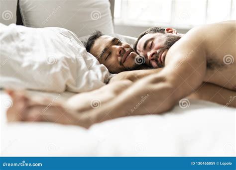 A Handsome Gay Men Couple On Bed Together Stock Image Image Of