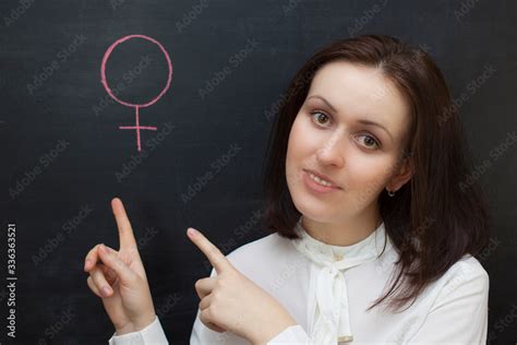 Teacher Girl At The Chalkboard Shows The Gender Symbol Of A Woman Sex Ed Stock Photo Adobe Stock