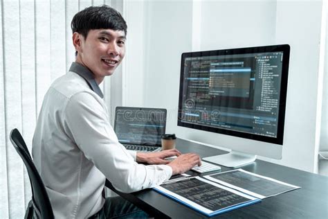 Young Programmer Working In Software Javascript Computer In It Office Writing Codes And Data