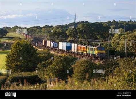 2 Freightliner Class 90 Electric Locomotives Hauling A Container