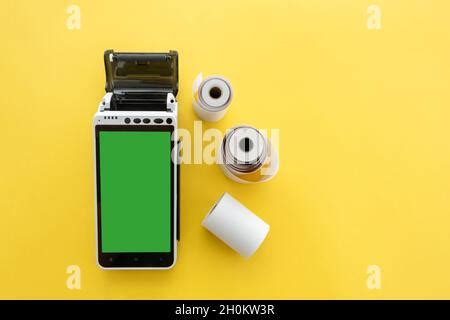 Yellow Payment Machine Or Pos Terminal Electronic Bill Payment And Credit Card With Invoice Or