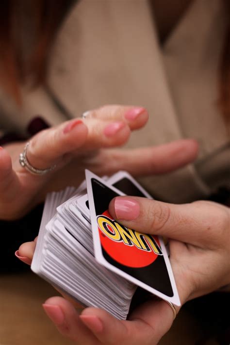 what does shuffle hands mean in uno tabletop game planet