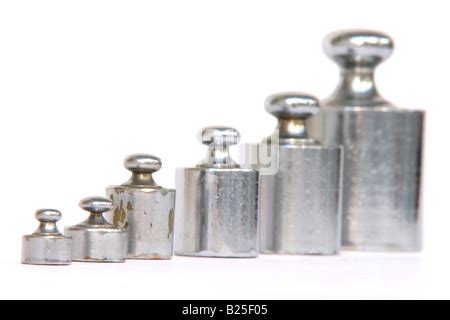 Different Weight Units In A Row Focus On The Big One Isolated On White Background Stock Photo