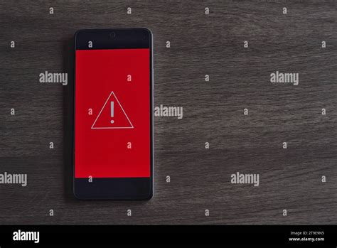 Smartphone With Triangle Caution Warning Icon Copy Space For Text System Error Malware And