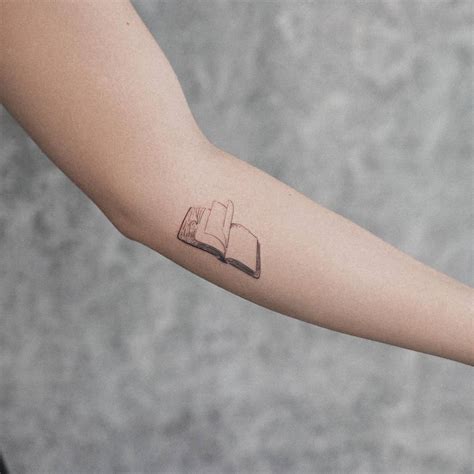 Book Tattoo Done On The Inner Forearm Illustrative