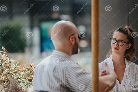 Startup Team In Business Meeting Discussing Strategies And Brainstorming Ideas Outdoors Stock